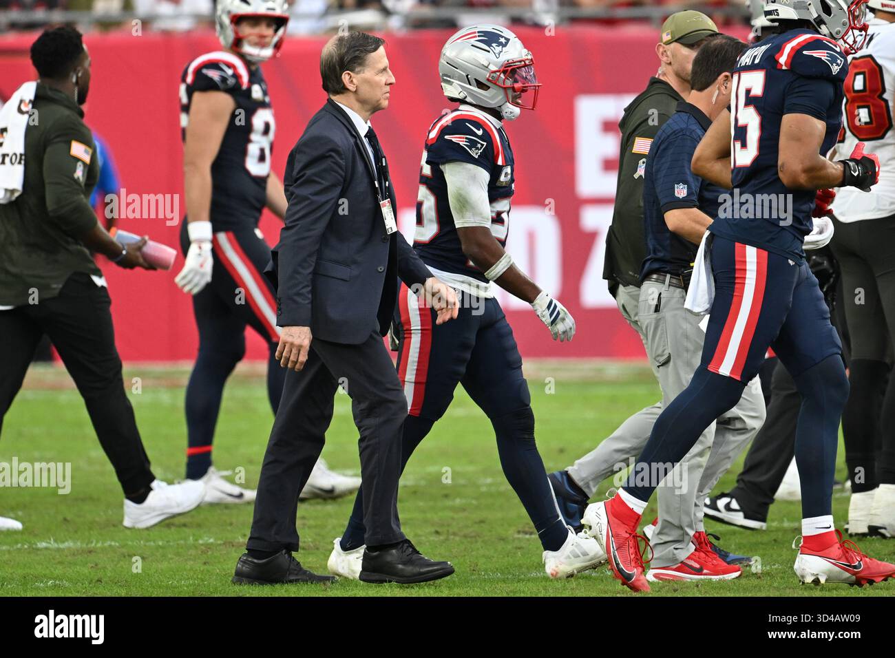 New England Patriots cornerback Marcus Jones (25) walks off the field ...