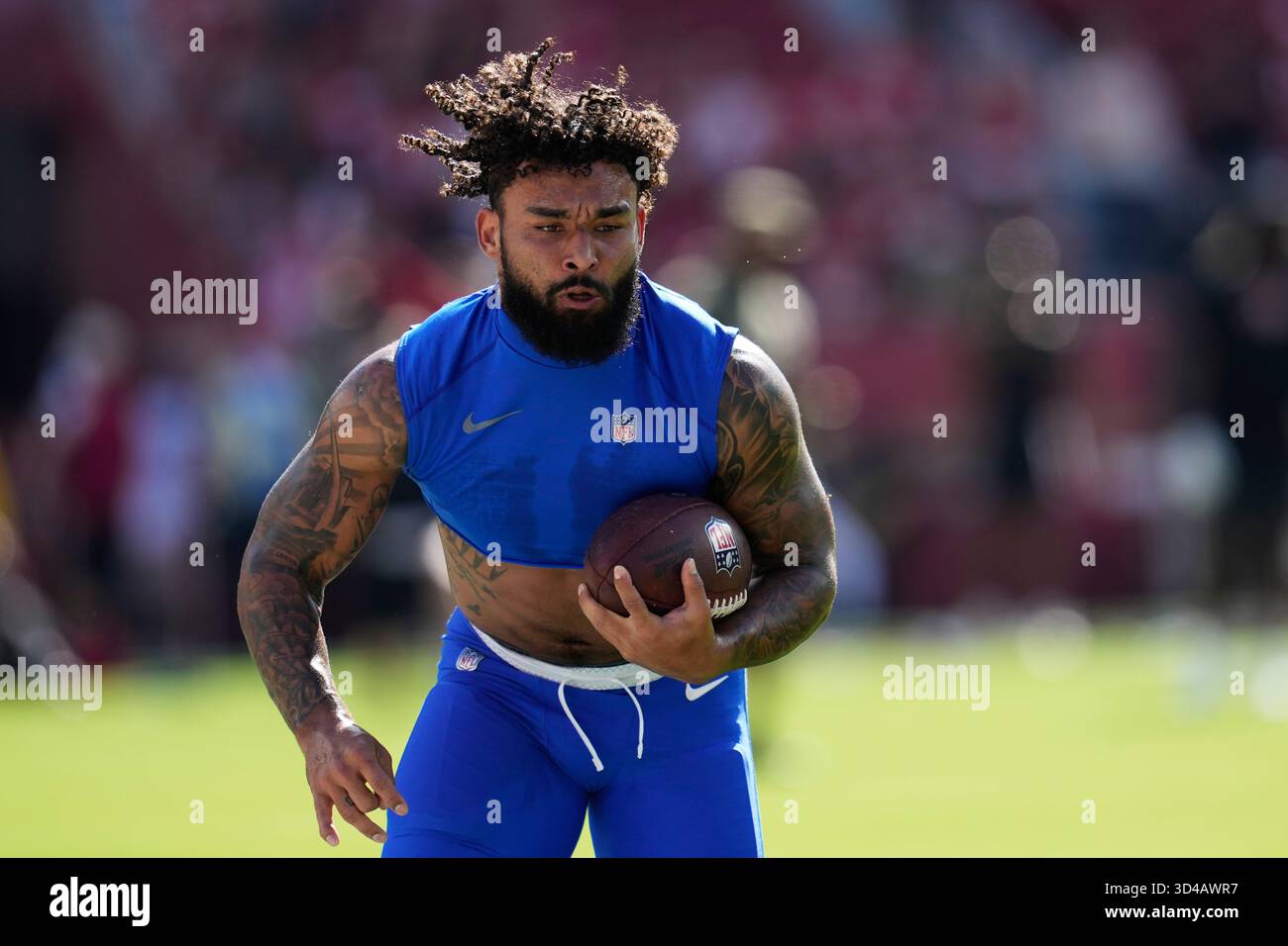 Los Angeles Rams running back Kyren Williams warms up before an NFL ...