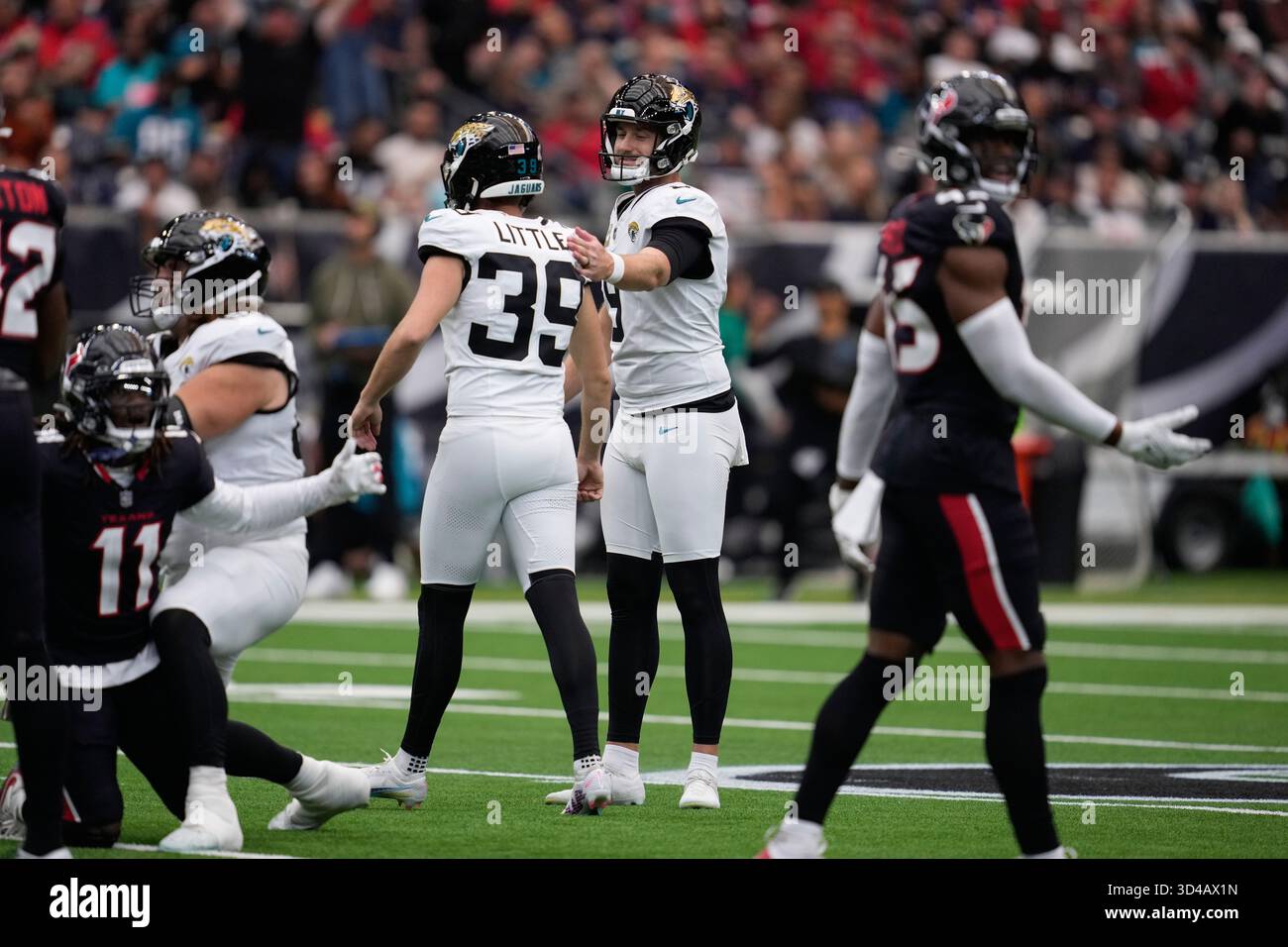 Jacksonville Jaguars place-kicker Cam Little (39) celebrates a field ...