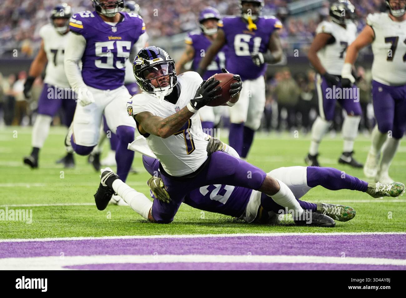 Baltimore Ravens wide receiver Rashod Bateman (7) is tackled by ...