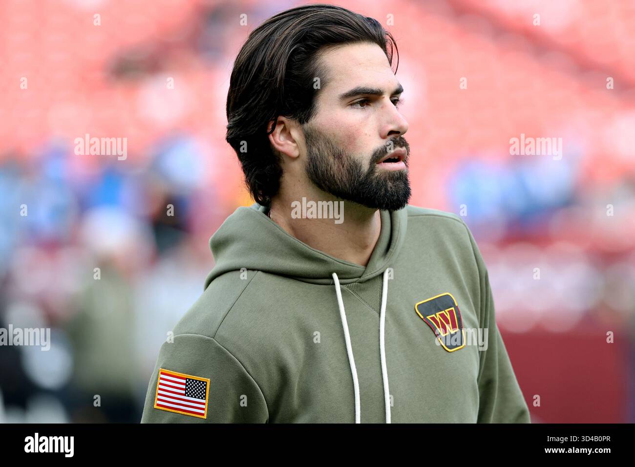 Washington Commanders quarterback Sam Hartman (15) looks on before an ...