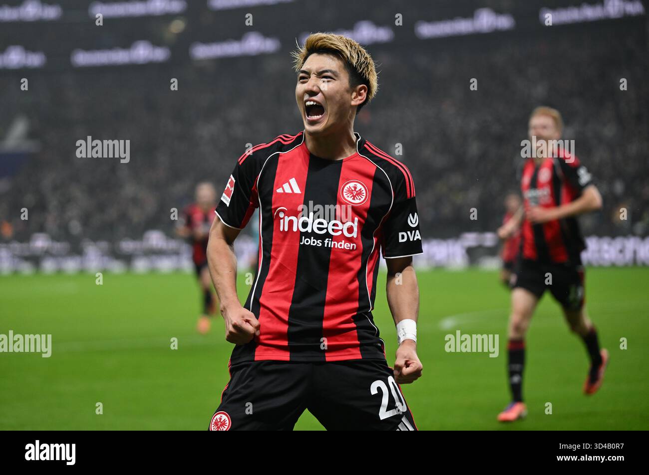 Frankfurt's Ritsu Doan celebrates after scoring during the German ...