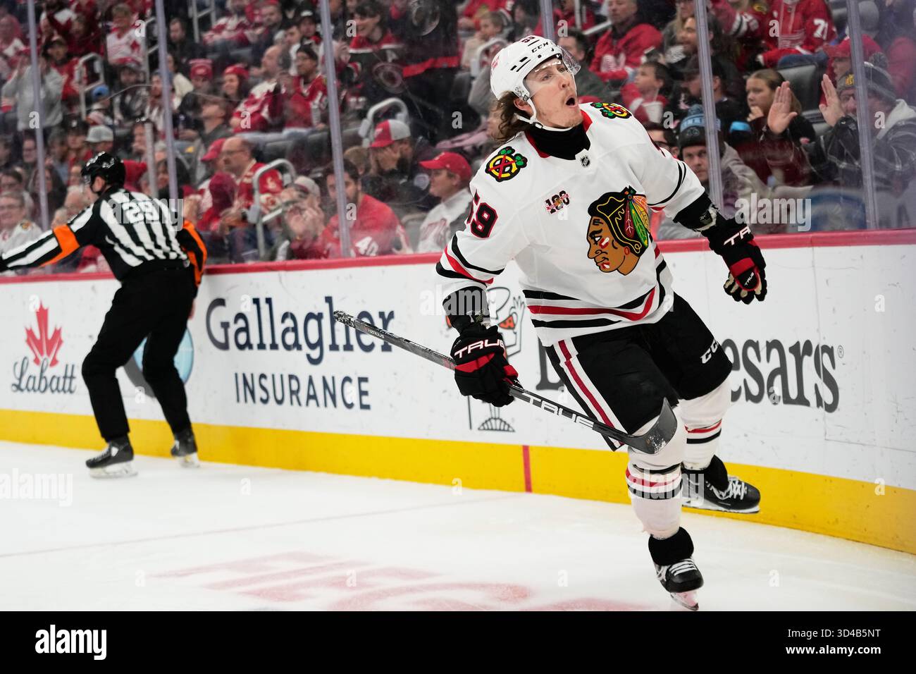 Chicago Blackhawks left wing Tyler Bertuzzi, right, celebrates after ...