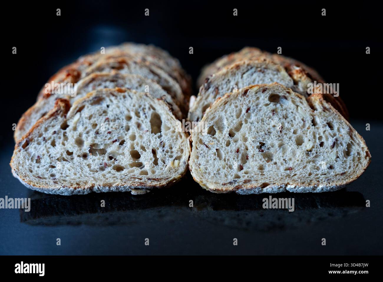 Cross section of homemade bread loaf showing airy texture and crispy ...