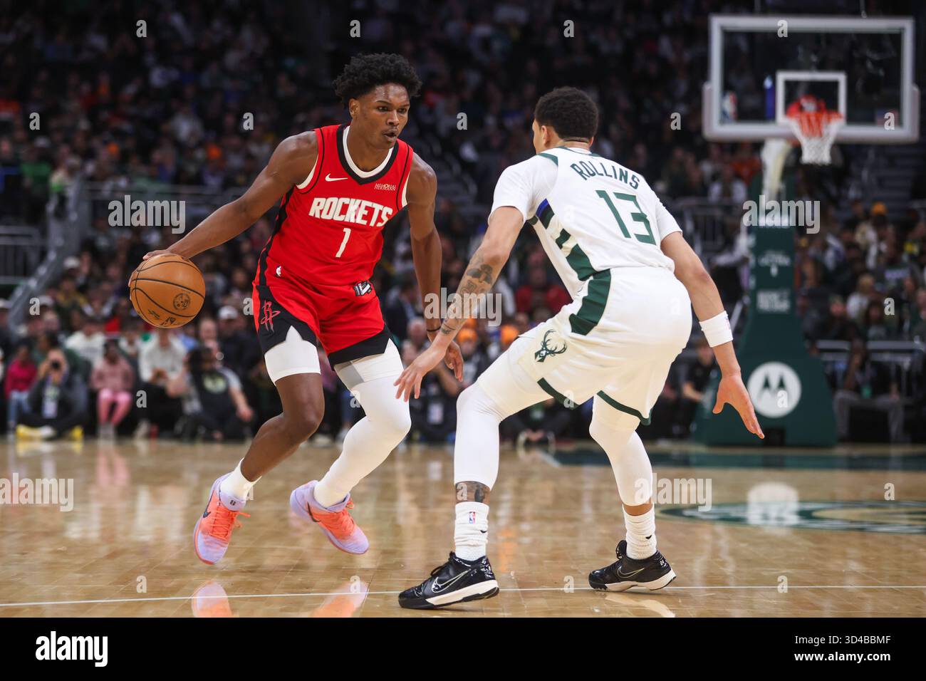 Houston Rockets' Amen Thompson (1) drives against Milwaukee Bucks' Ryan ...