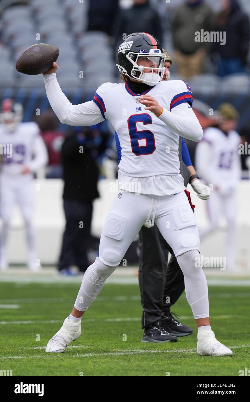 New York Giants quarterback Jaxson Dart warms up before an NFL football ...