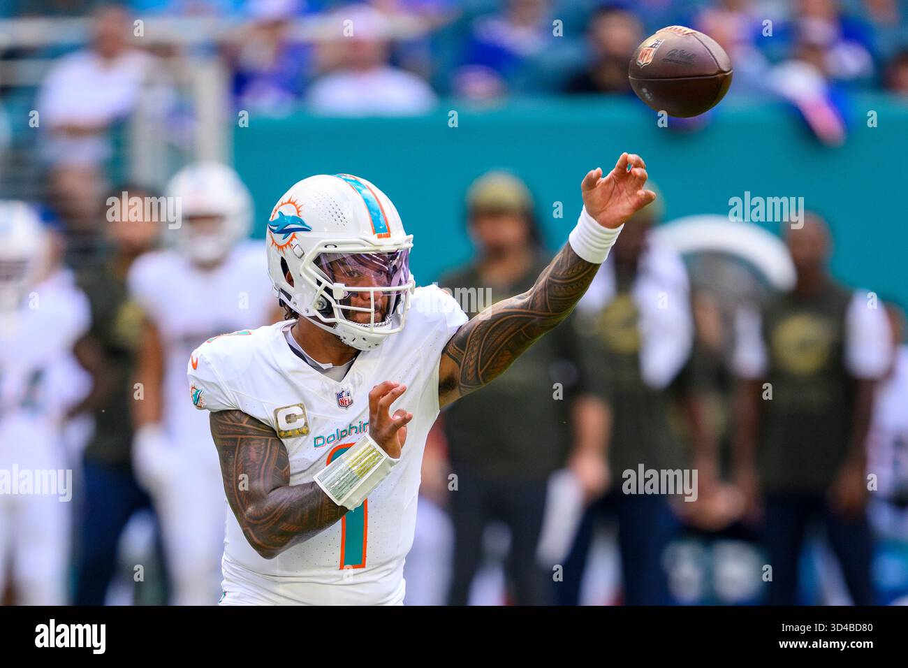 Miami Dolphins quarterback Tua Tagovailoa (1) throws the ball during an ...