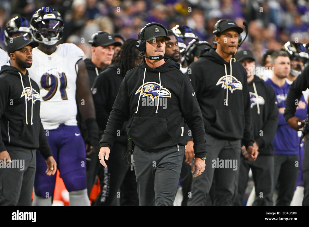 Baltimore Ravens head coach John Harbaugh watches their game against ...