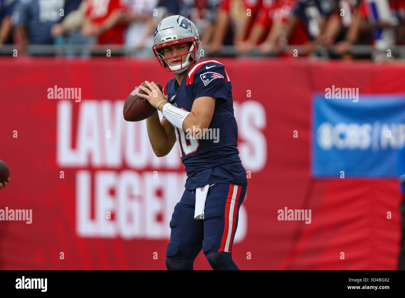 New England Patriots quarterback Drake Maye (10) warms up before an NFL ...