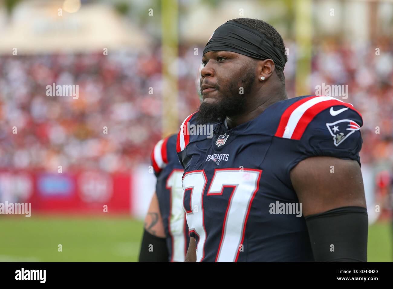 New England Patriots defensive end Milton Williams (97) walks the ...