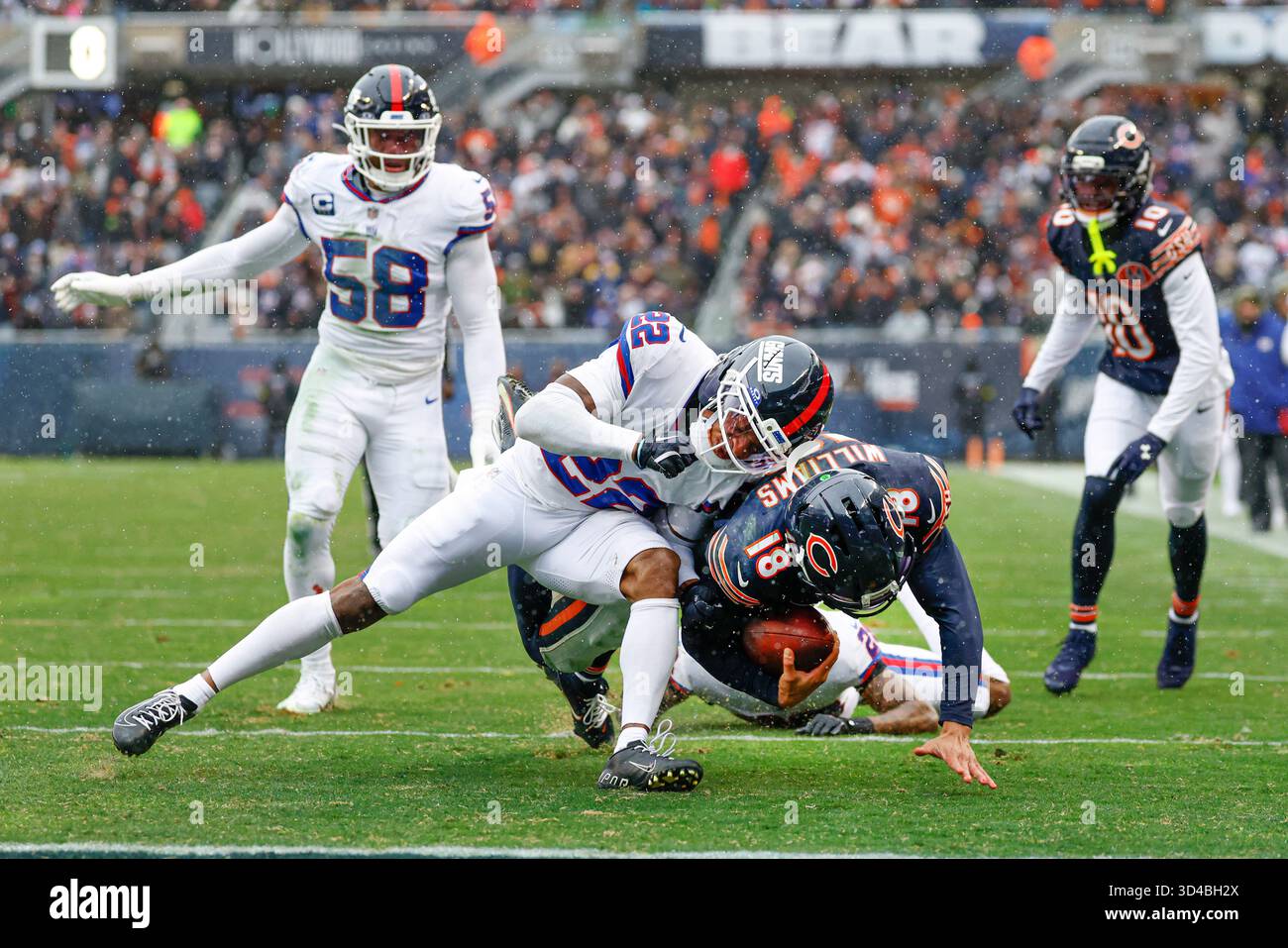 New York Giants cornerback Dru Phillips (22) tackles Chicago Bears ...