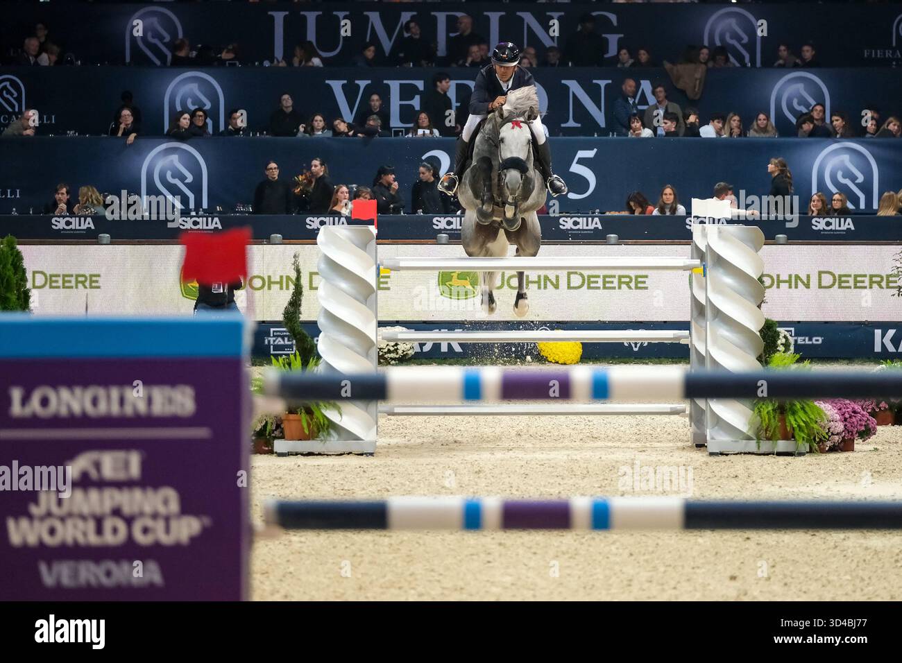Mariano Martinez Bastida from Spain, ride Poseidon, is in action during the CSI5*-W Longines FEI ...