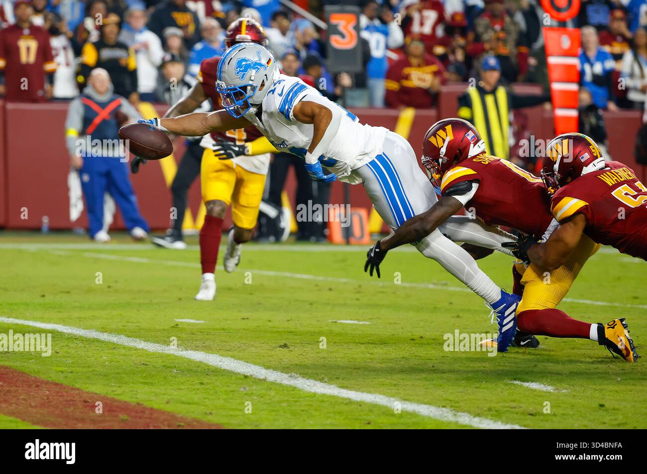 Nov 9, 2025: Detroit Lions WR #14 Amon-Ra St. Brown stretches for a ...