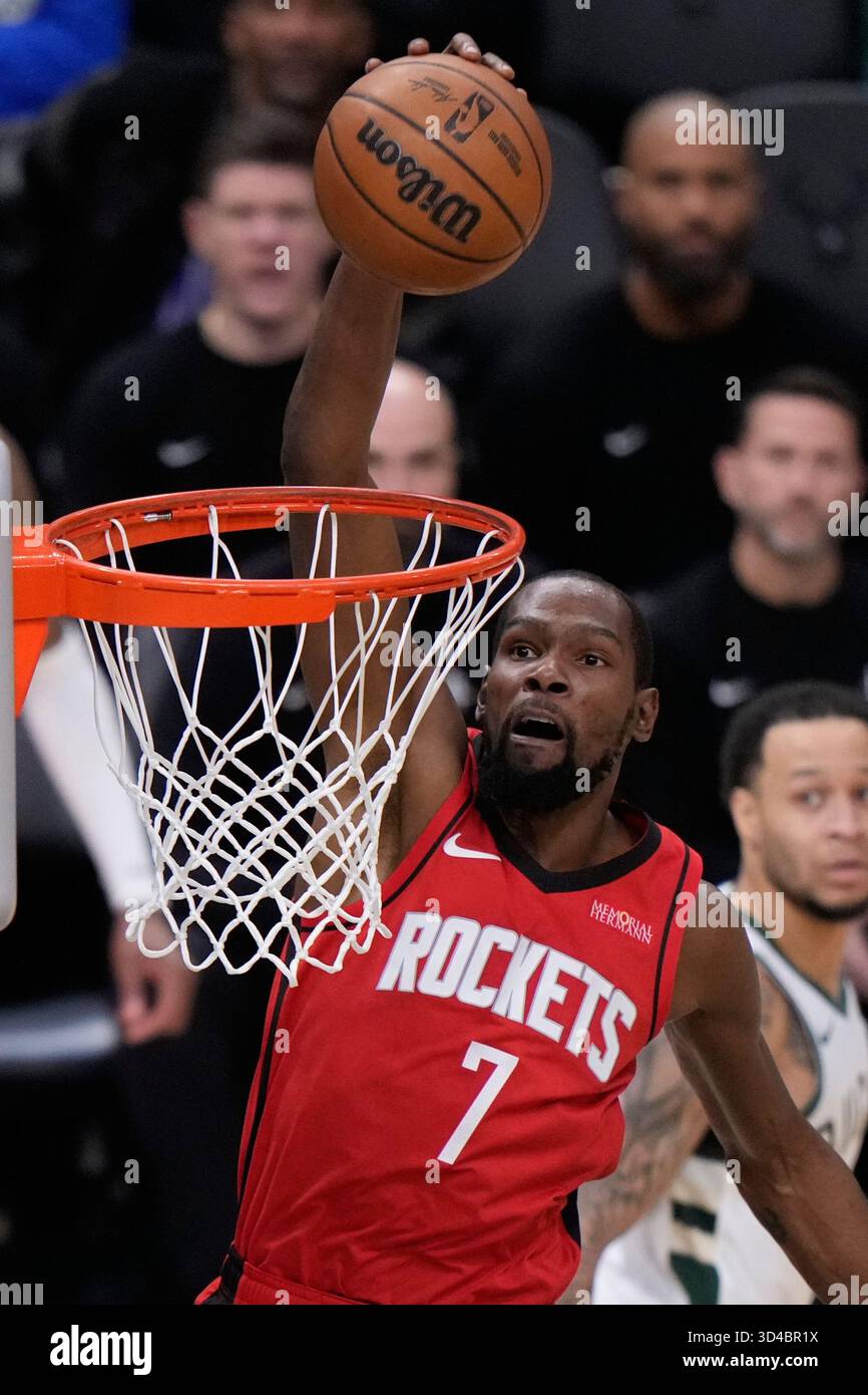 Houston Rockets' Kevin Durant dunks during the second half of an NBA ...