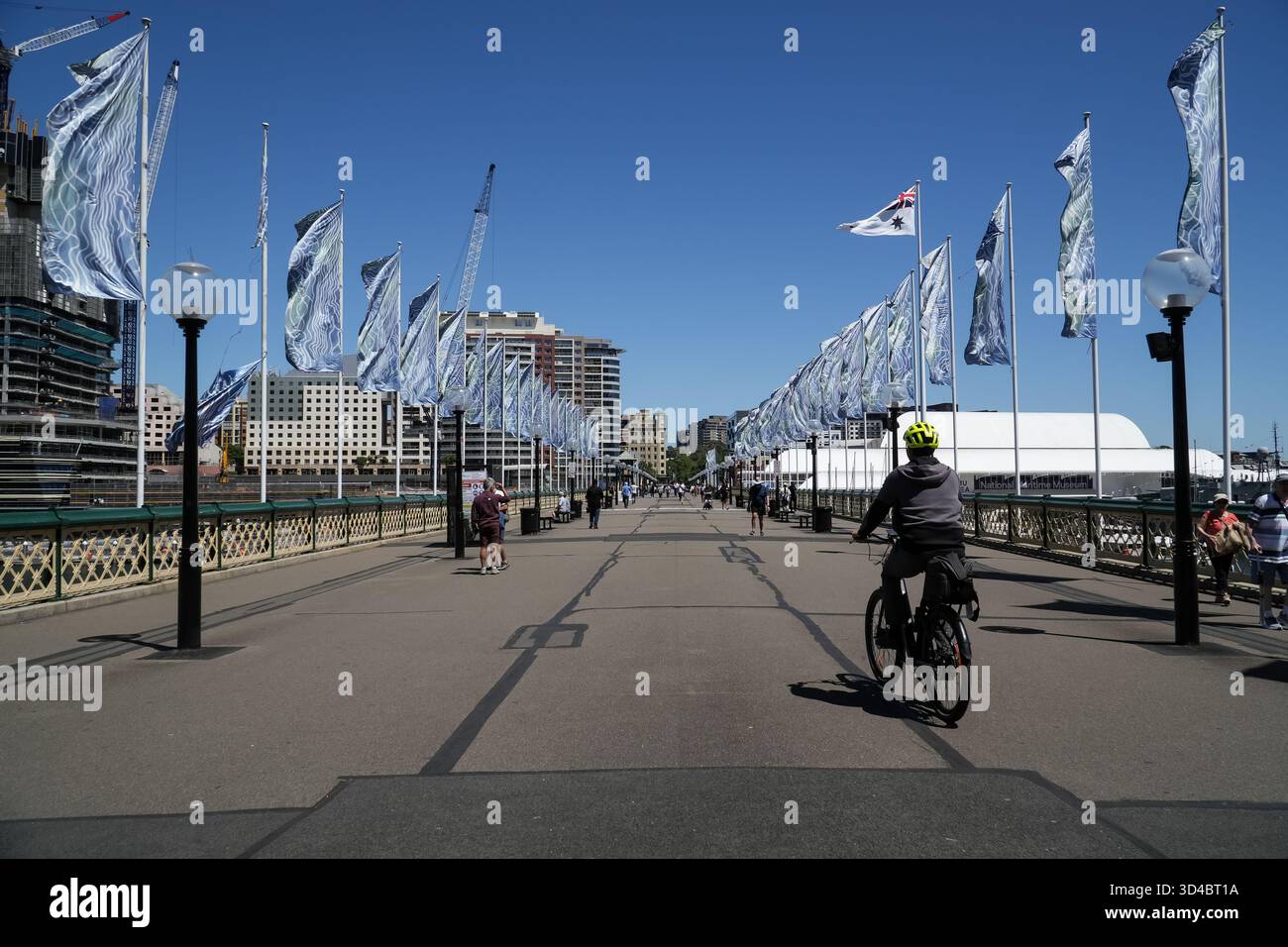 Pyrmont Bridge in Sydney, Australia, on a sunny day. A cyclist and ...