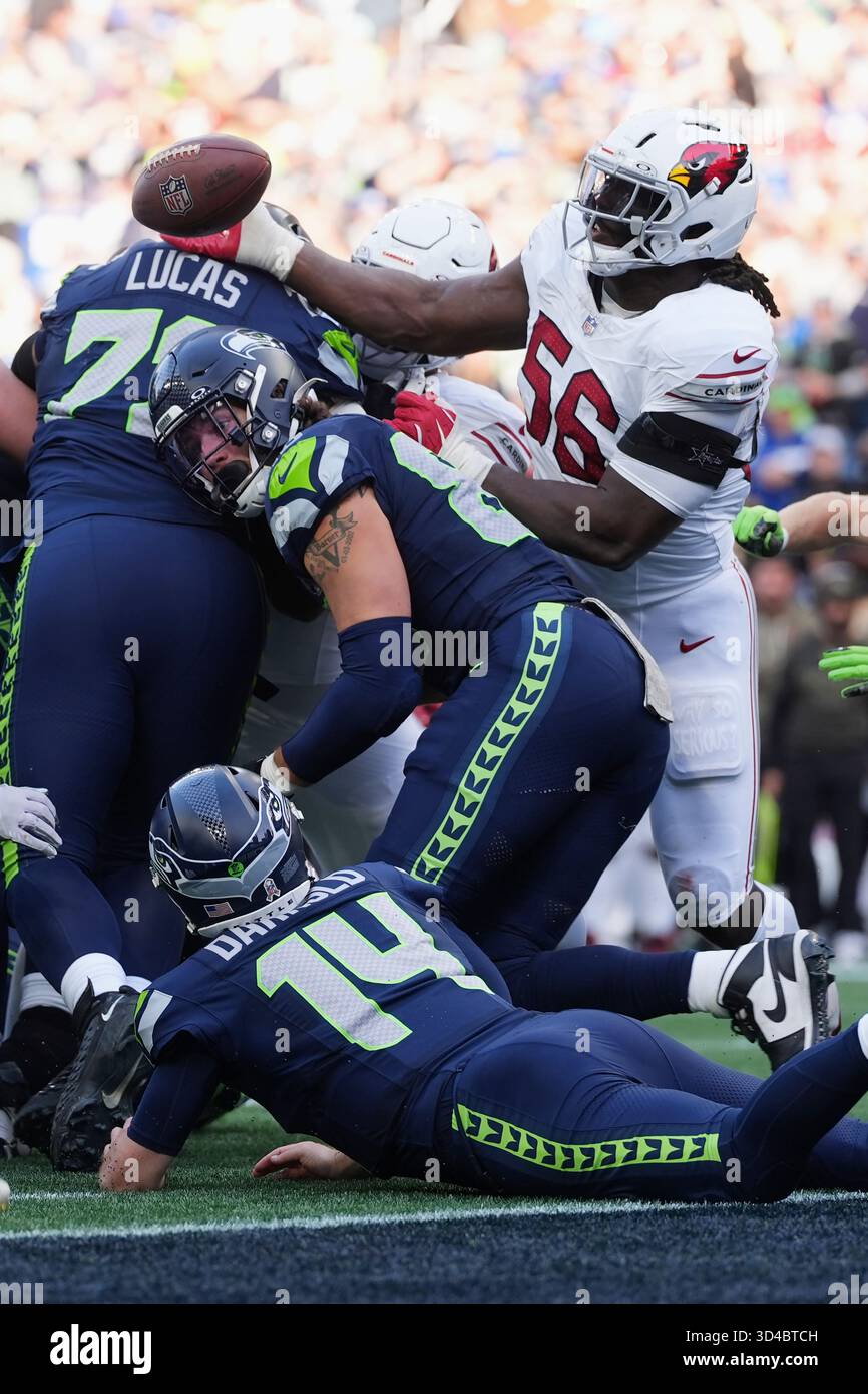 Arizona Cardinals defensive end Darius Robinson (56) is unable to come ...
