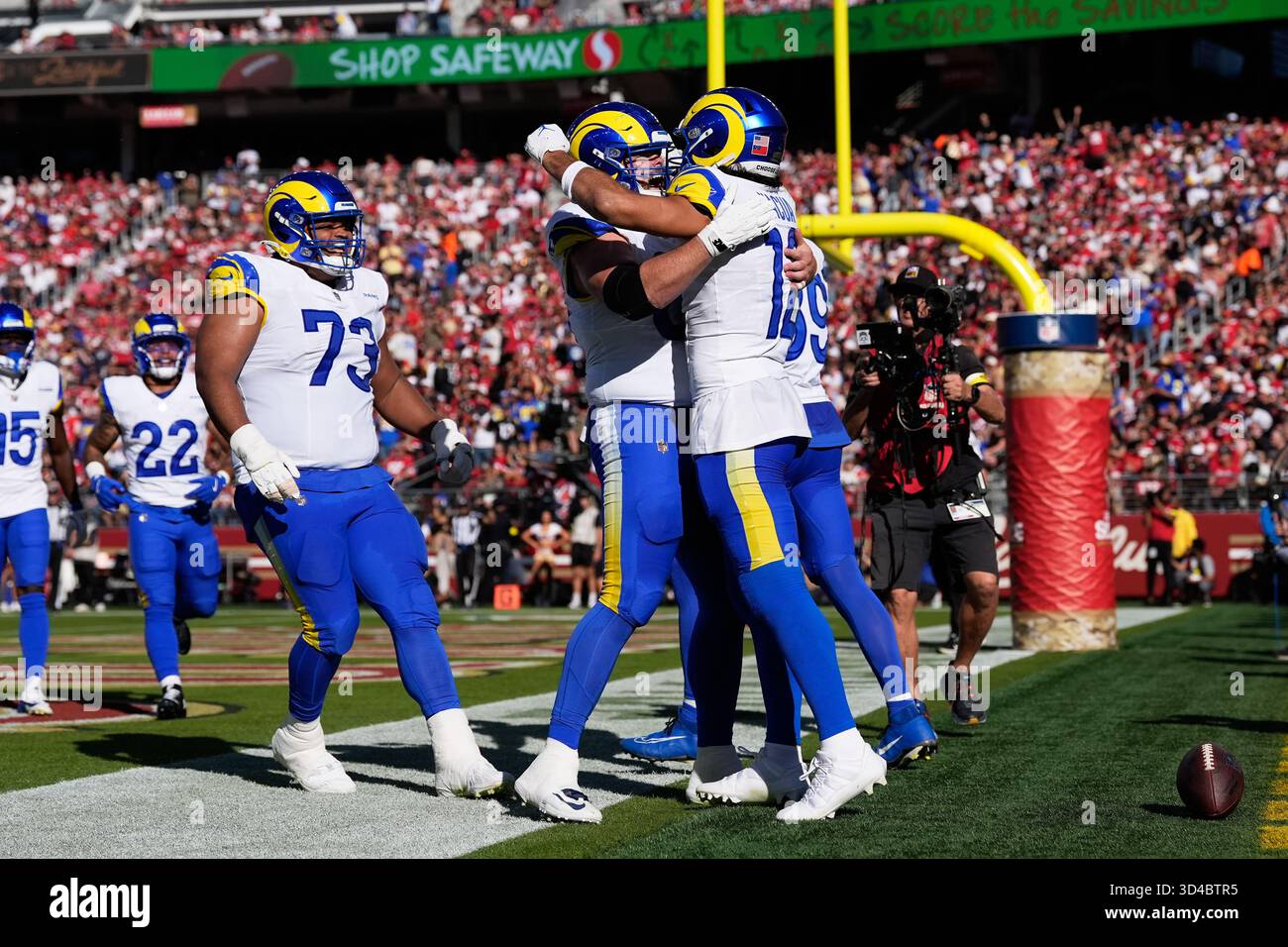 Los Angeles Rams wide receiver Puka Nacua, right, is congratulated by ...