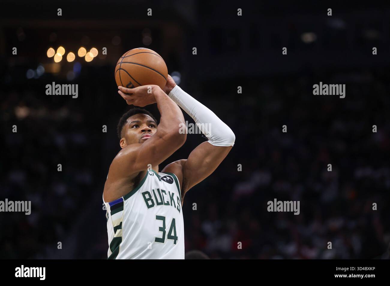Milwaukee Bucks' Giannis Antetokounmpo prepares to shoot a free throw during the second half of ...