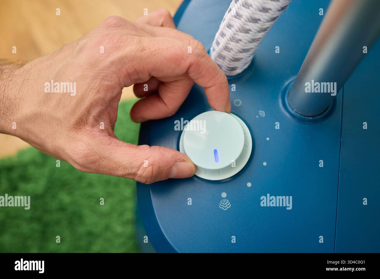 Making hand adjustments to the settings of various steam appliances for ...