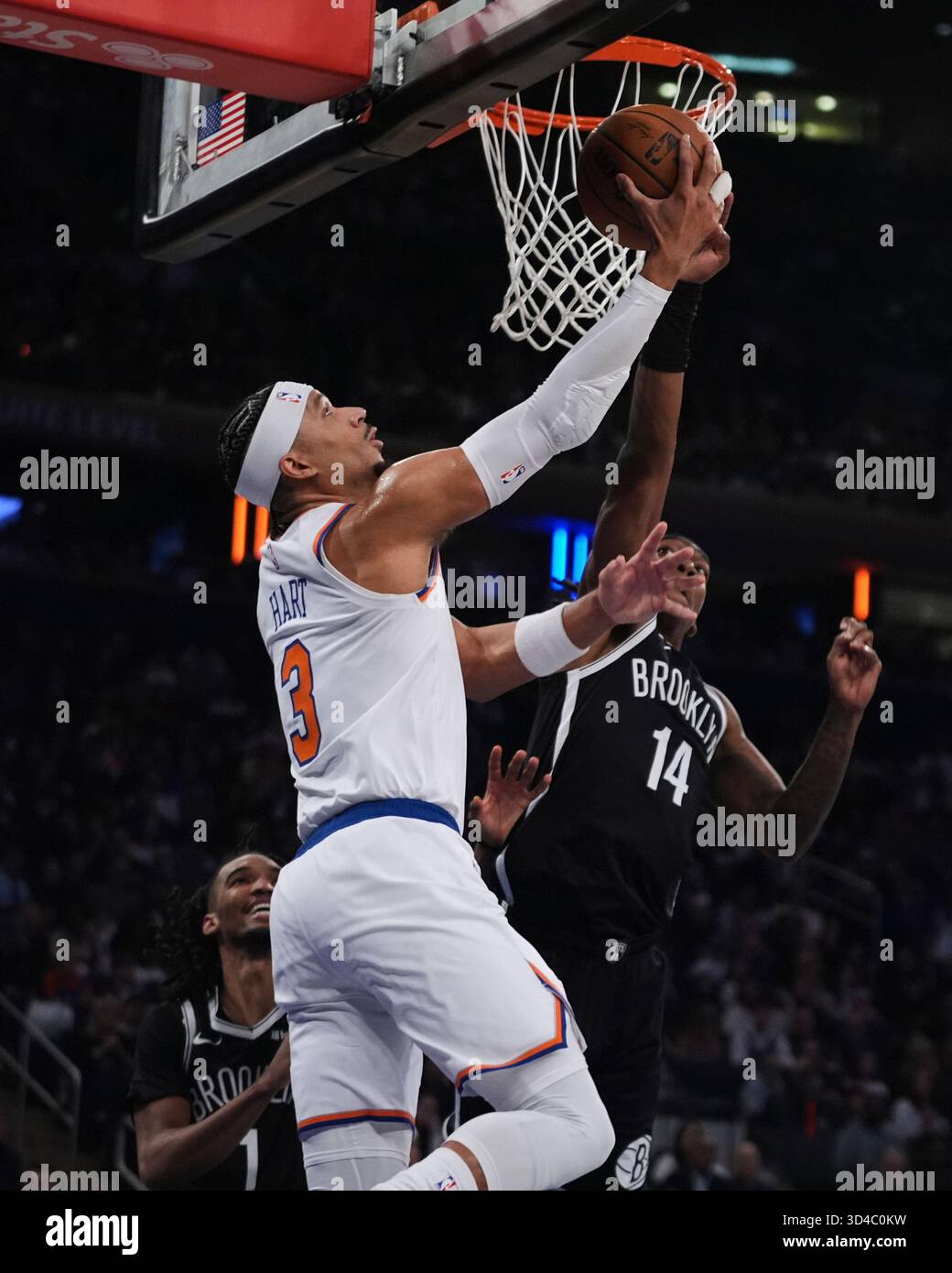 New York Knicks' Josh Hart (3) drives past Brooklyn Nets' Terance Mann ...