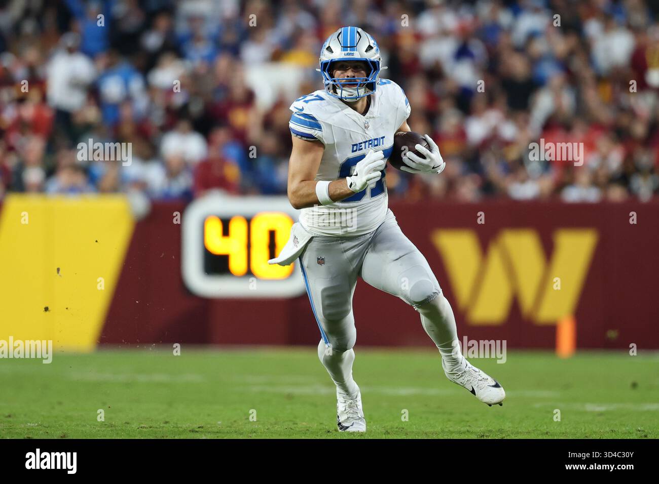Detroit Lions tight end Sam LaPorta (87) runs with the ball after ...