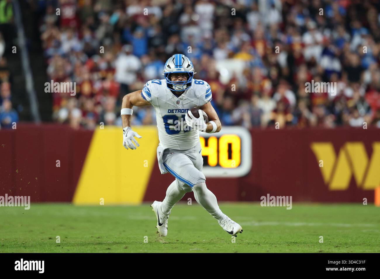 Detroit Lions tight end Sam LaPorta (87) runs with the ball after ...