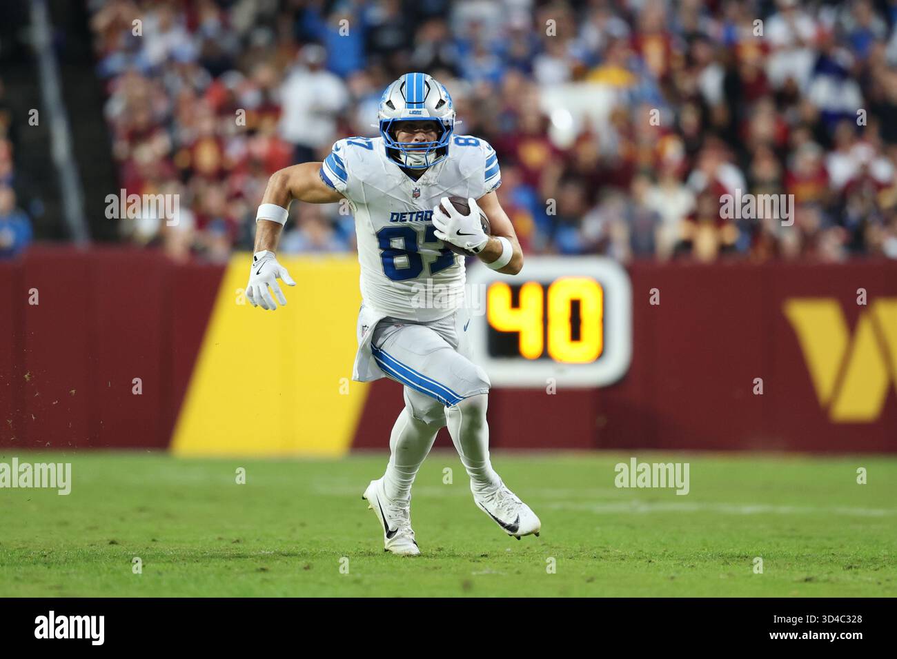Detroit Lions tight end Sam LaPorta (87) runs with the ball after ...