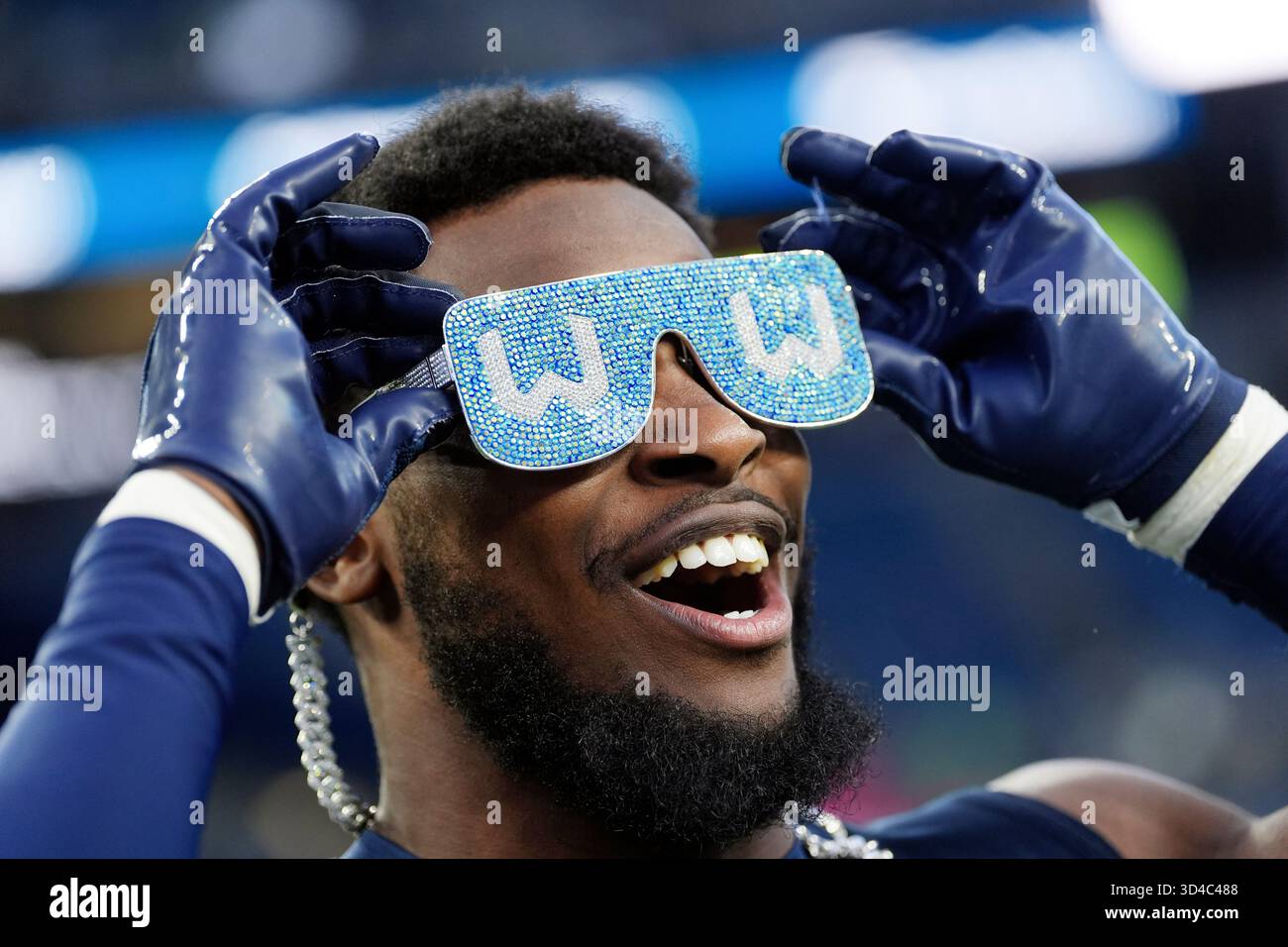 Seattle Seahawks cornerback Devon Witherspoon celebrates a win against ...