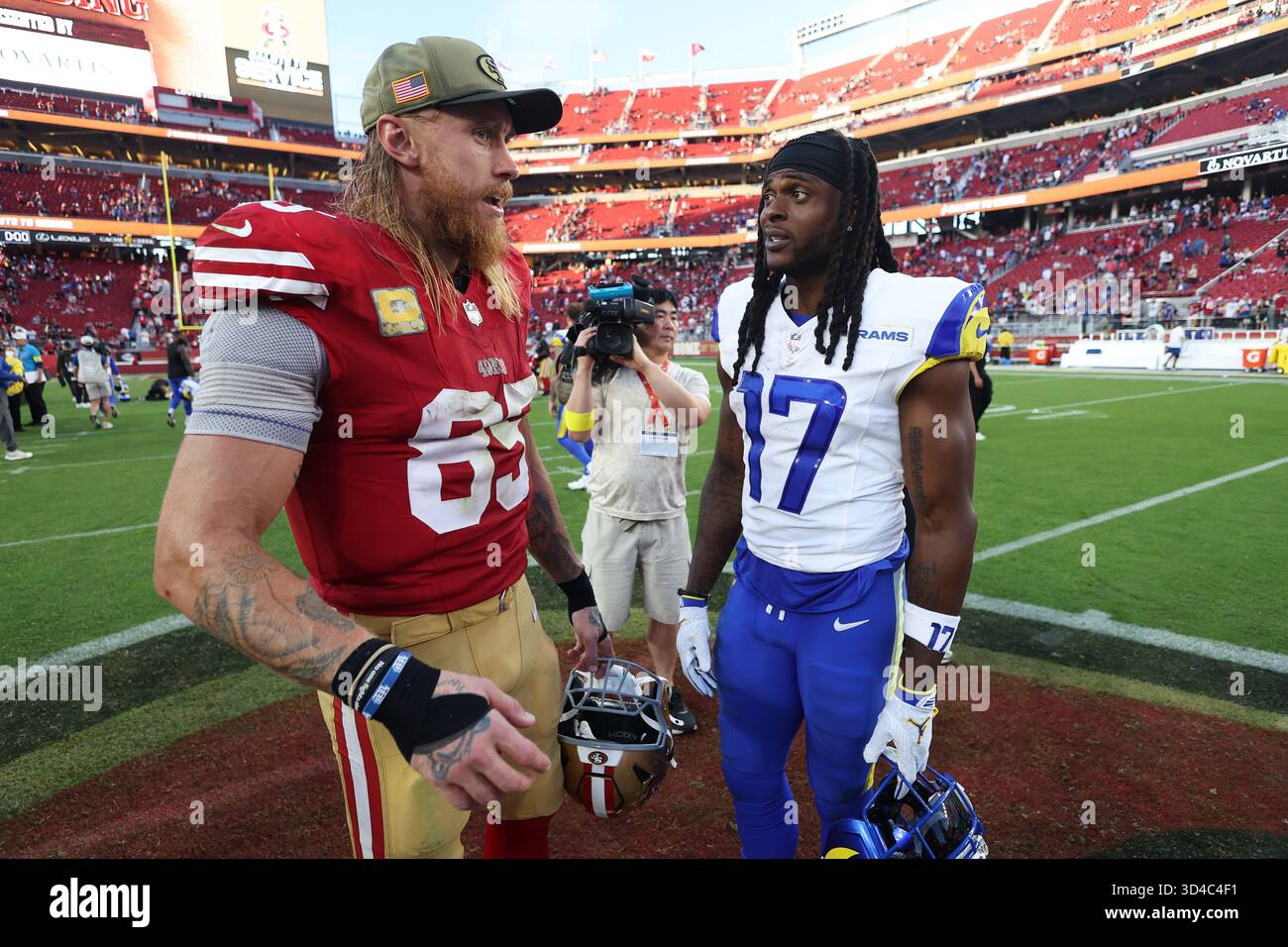 San Francisco 49ers tight end George Kittle (85) talks with Los Angeles ...