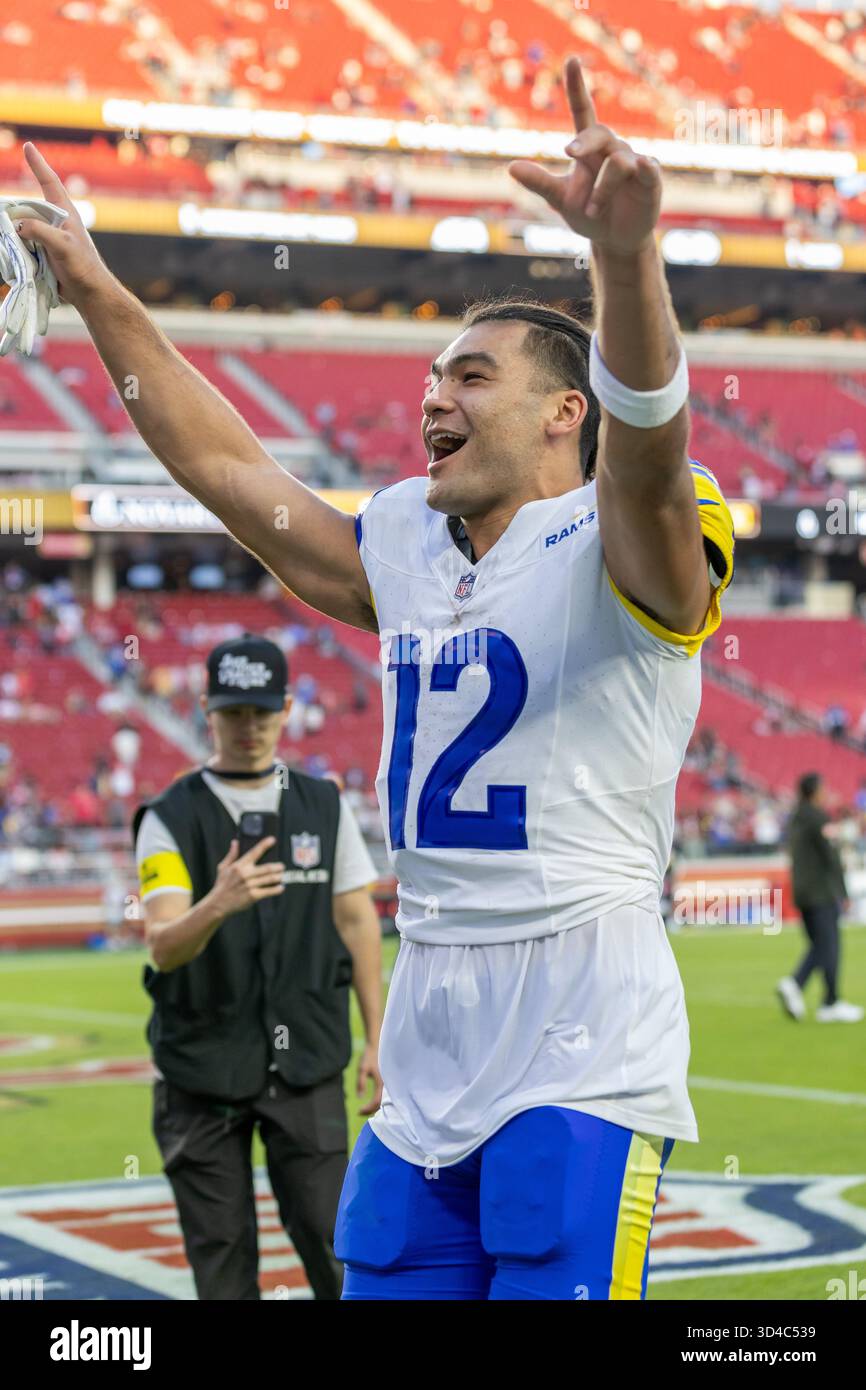 Los Angeles Rams wide receiver Puka Nacua (12) celebrates while walking ...