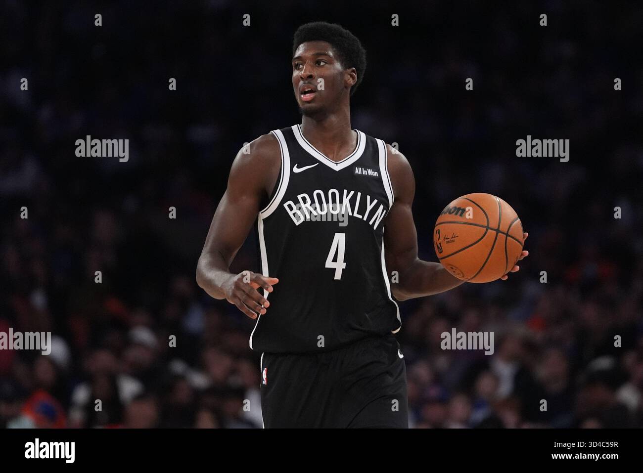 Brooklyn Nets' Drake Powell (4) looks to pass during the second half of ...