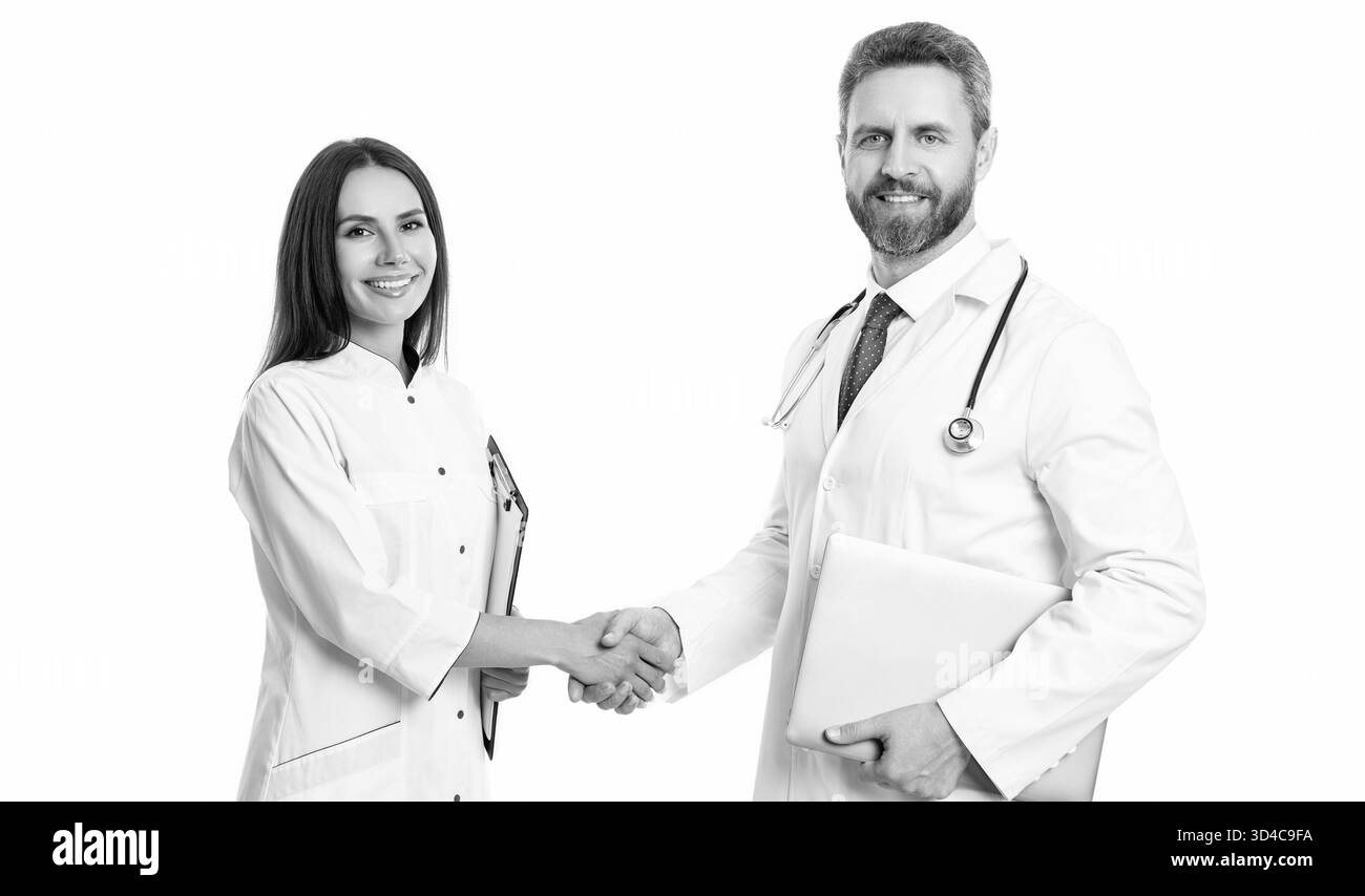 successful treatment. doctor handshake with nurse. two doctor shaking ...