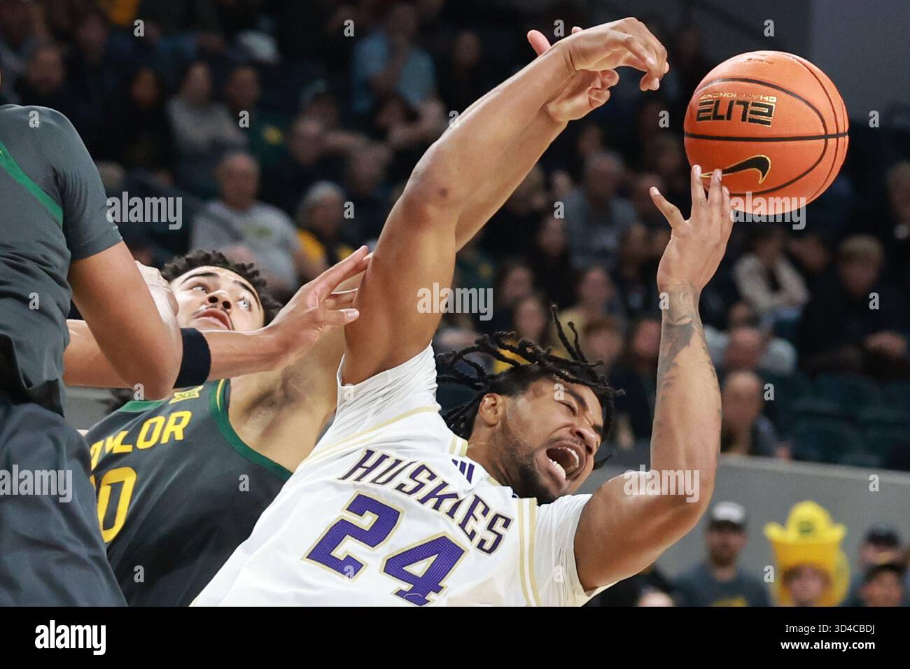 Washington center Lathan Sommerville (24) battles Baylor guard Isaac ...