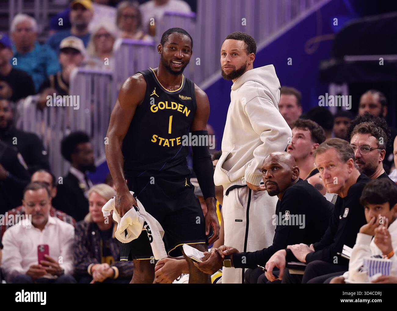 Golden State Warriors forward Jonathan Kuminga (1) and guard Stephen ...