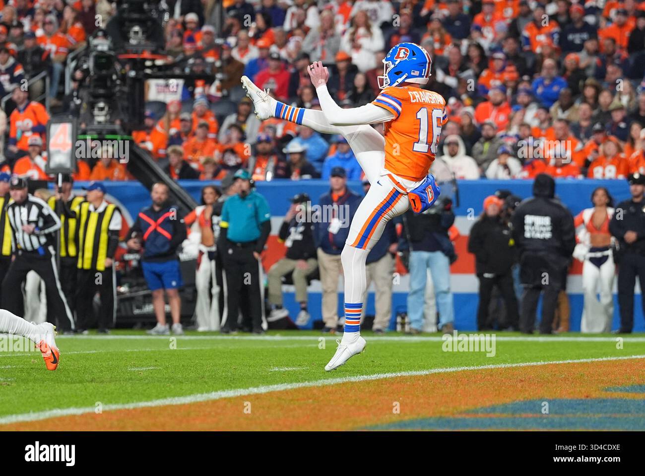 Denver Broncos punter Jeremy Crawshaw (16) in the first half of an NFL ...