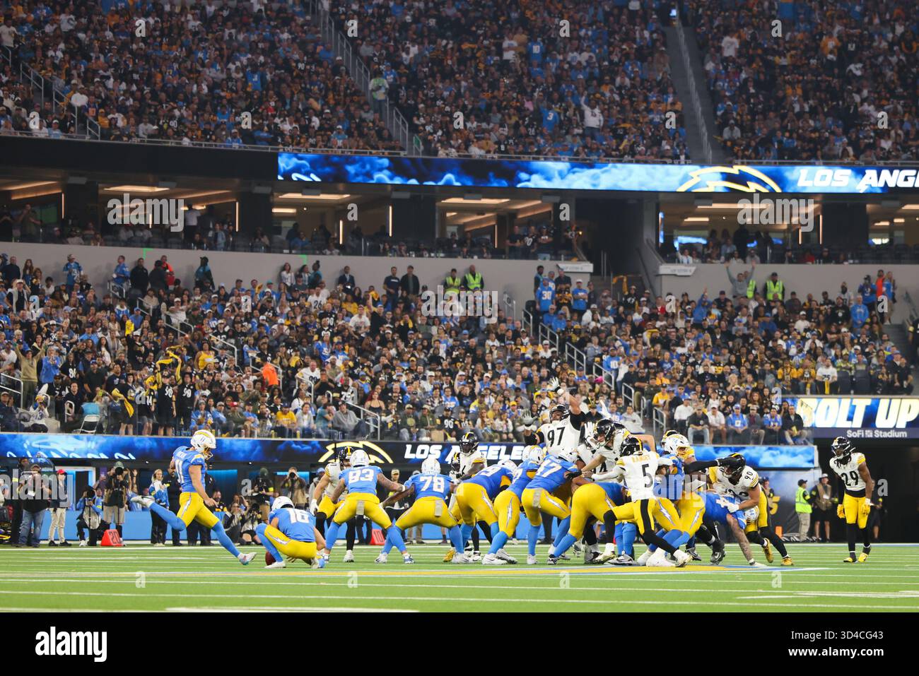 Los Angeles Chargers place kicker Cameron Dicker (11) kicks for a field ...