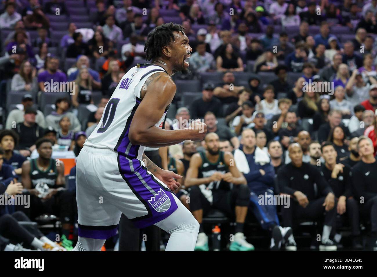 Sacramento Kings guard Malik Monk reacts to a no-call from the referees ...