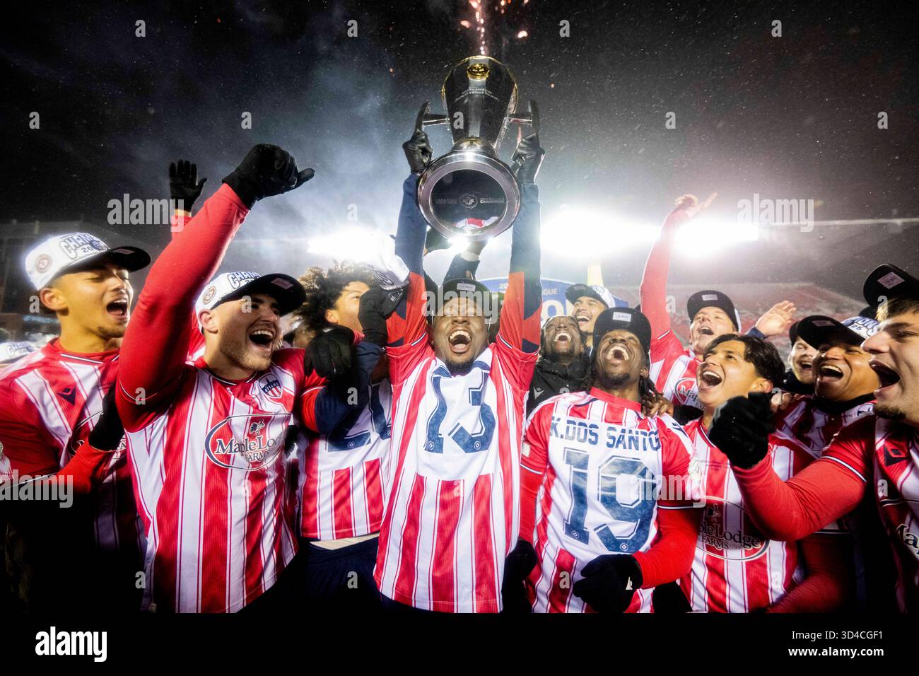 Atletico Ottawa's Ballou Tabla (13) raises the North Star Cup following ...