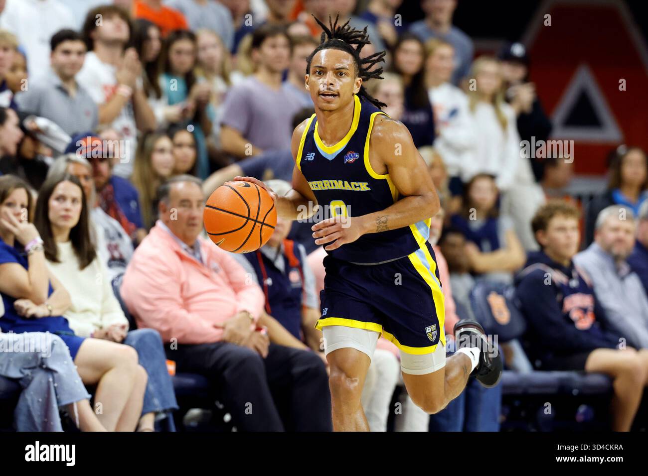 Merrimack guard Malik Edmead dribbles the ball against Auburn during ...