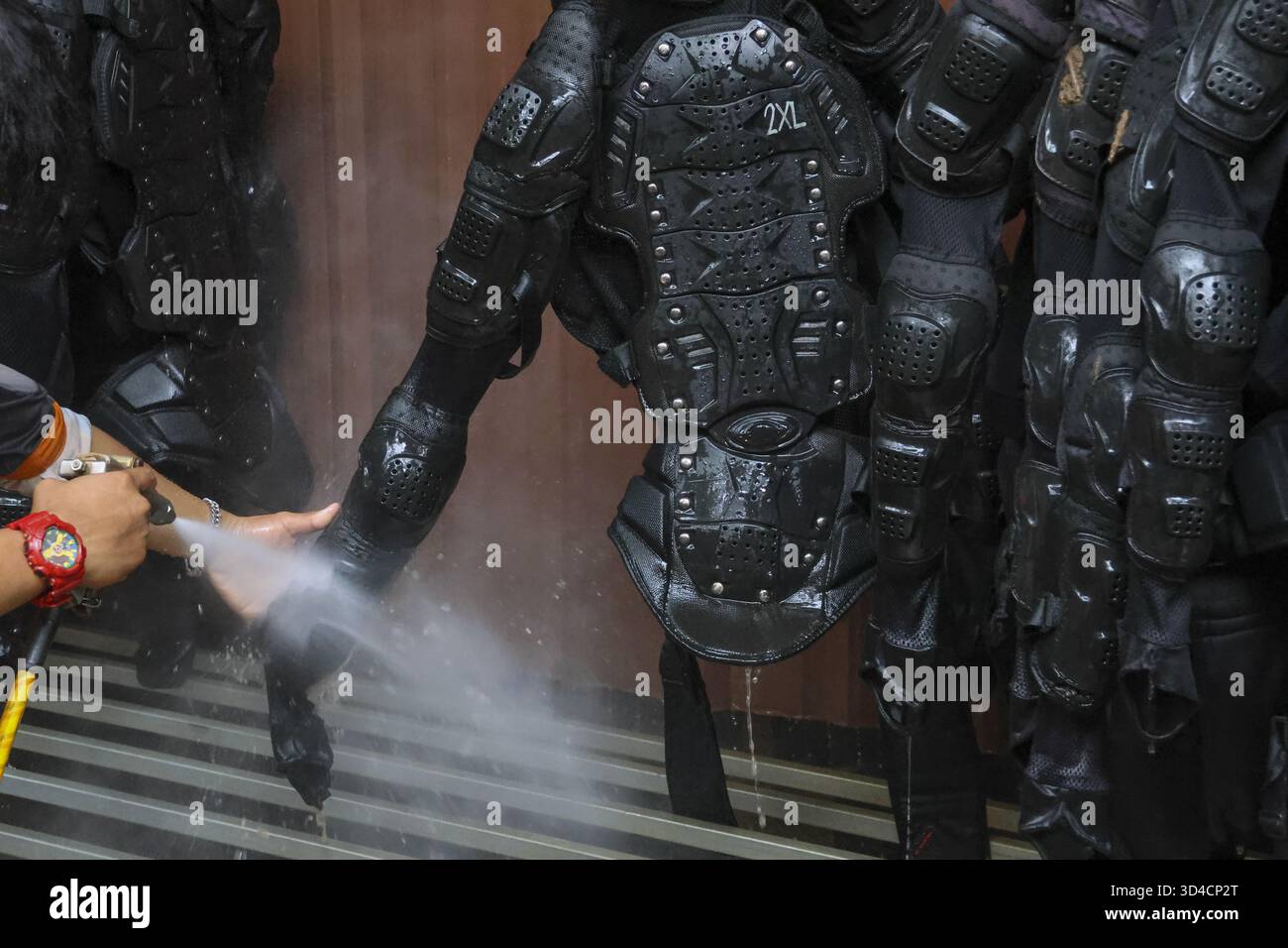 Riot police officer cleaning hi-res stock photography and images - Alamy