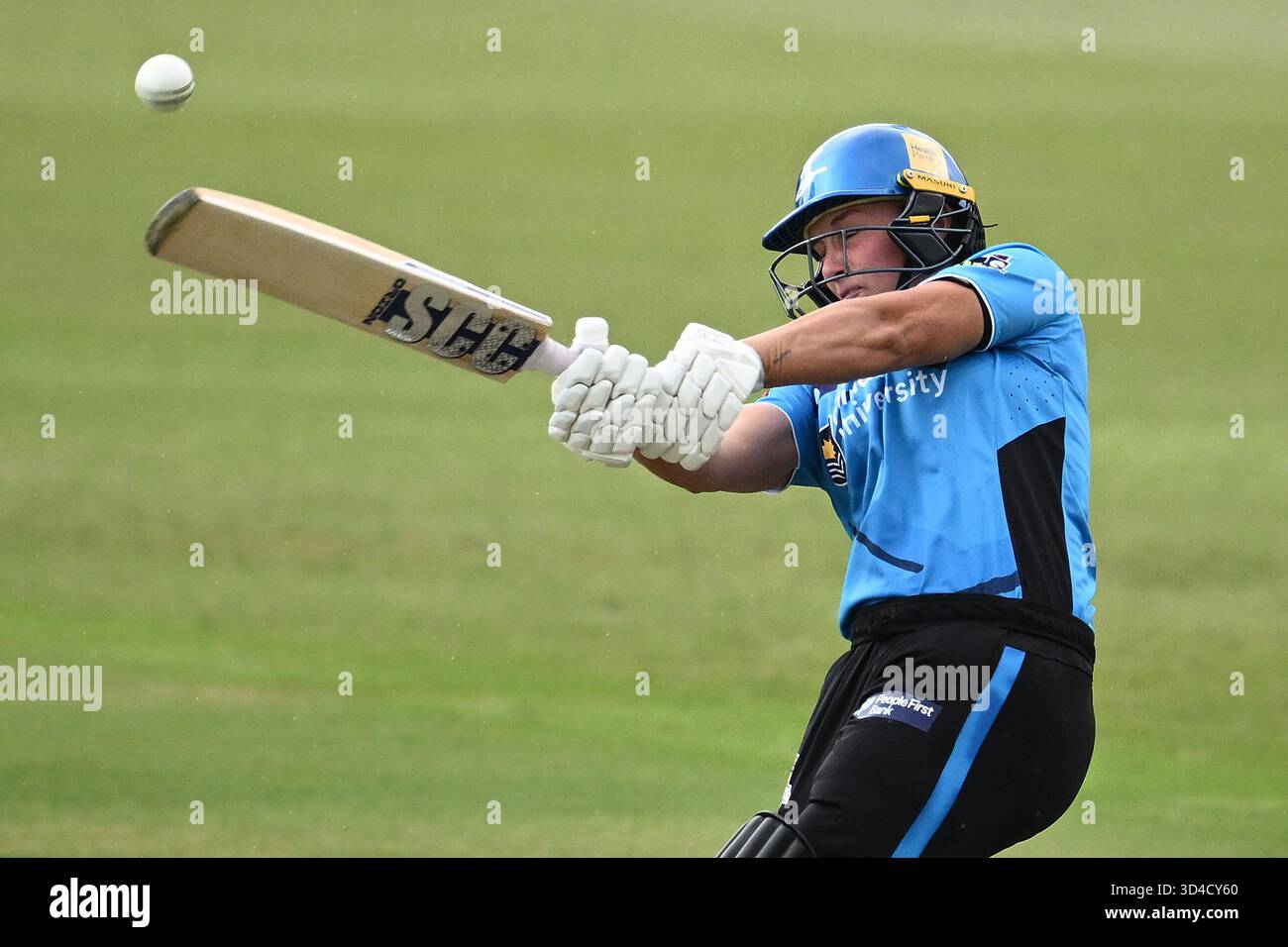 Maddie Penna of the Strikers bats during the WBBL match between the ...