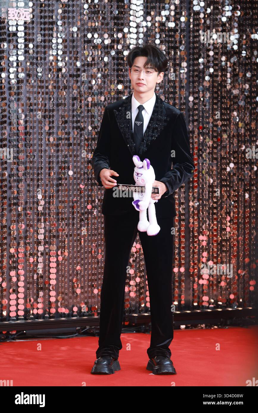 Chinese host Qi Sijun attends an activity in Beijing, China, 3 November ...
