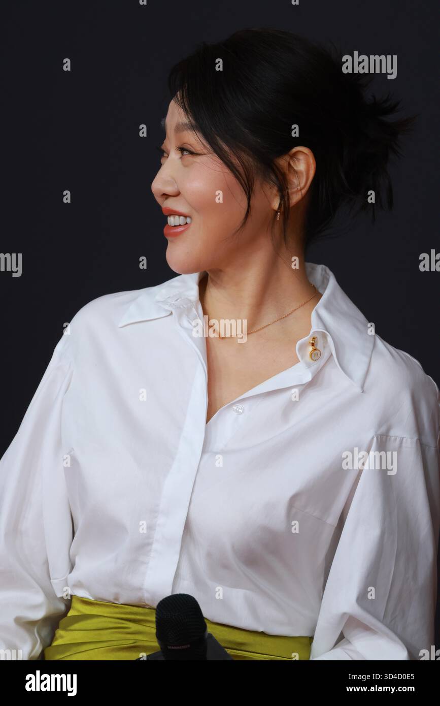 Chinese film and television actress Yan Ni attends an activity in ...