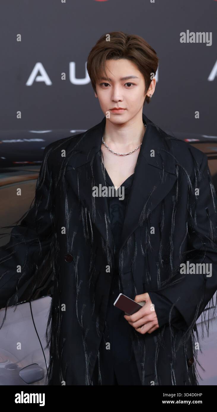 Chinese actor and singer Hou Minghao attends an activity in Beijing ...