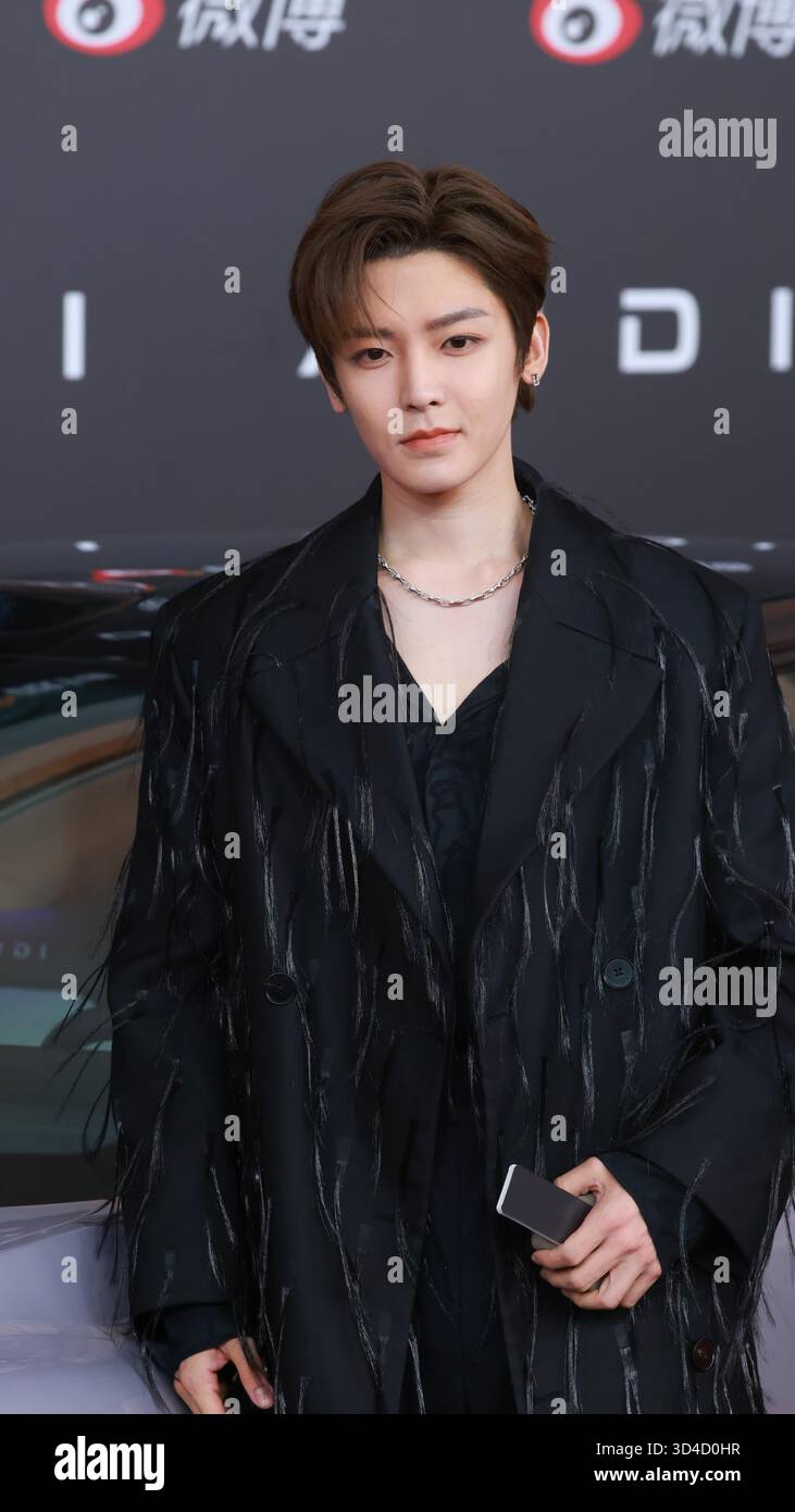 Chinese actor and singer Hou Minghao attends an activity in Beijing ...