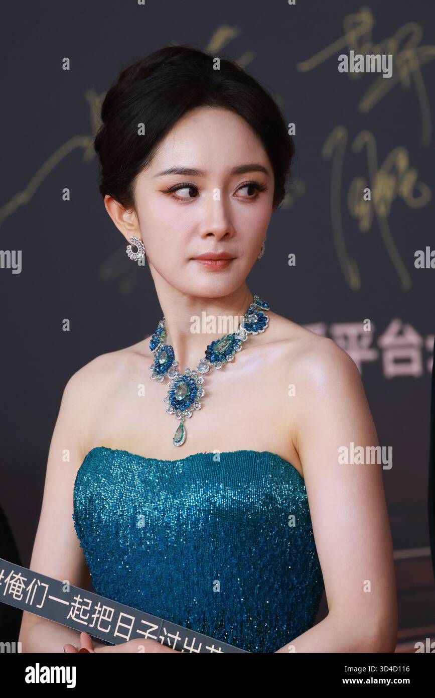 Chinese actress and singer Yang Mi attends an activity in Beijing ...