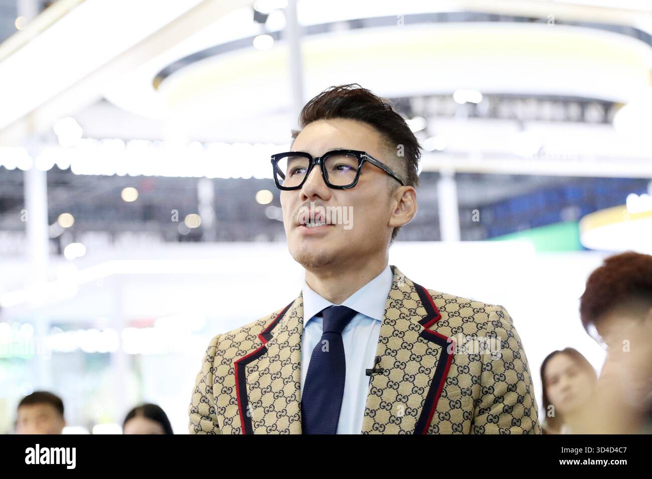 Chinese actor, model, singer, designer and producer Hu Bing appears at ...