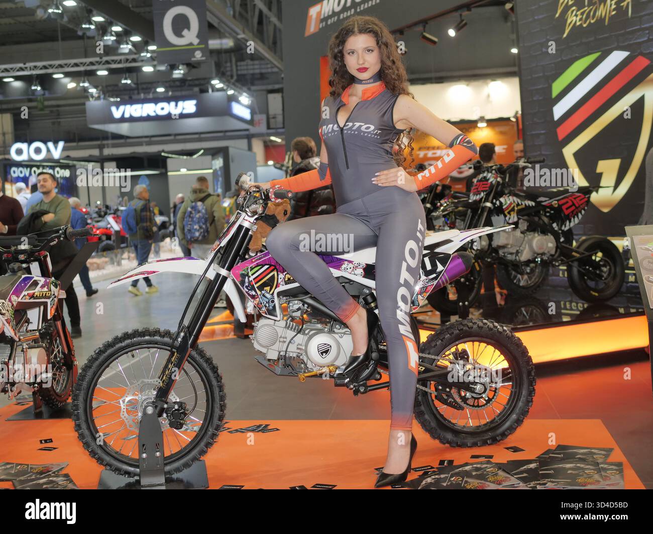 The Eicma Girls, a parade of models riding high-quality motorcycles at ...