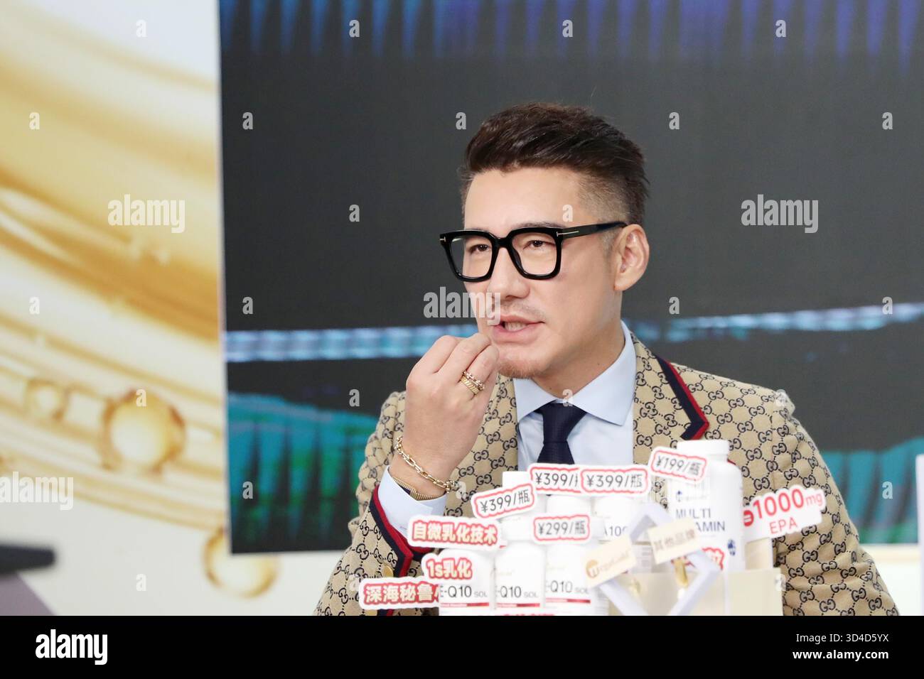 Chinese actor, model, singer, designer and producer Hu Bing appears at ...