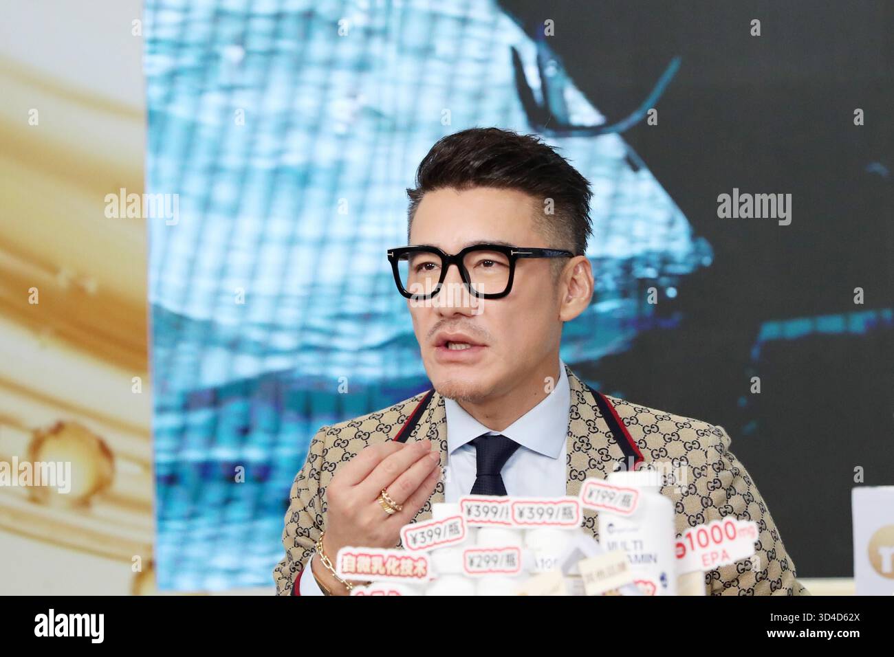 Chinese actor, model, singer, designer and producer Hu Bing appears at ...